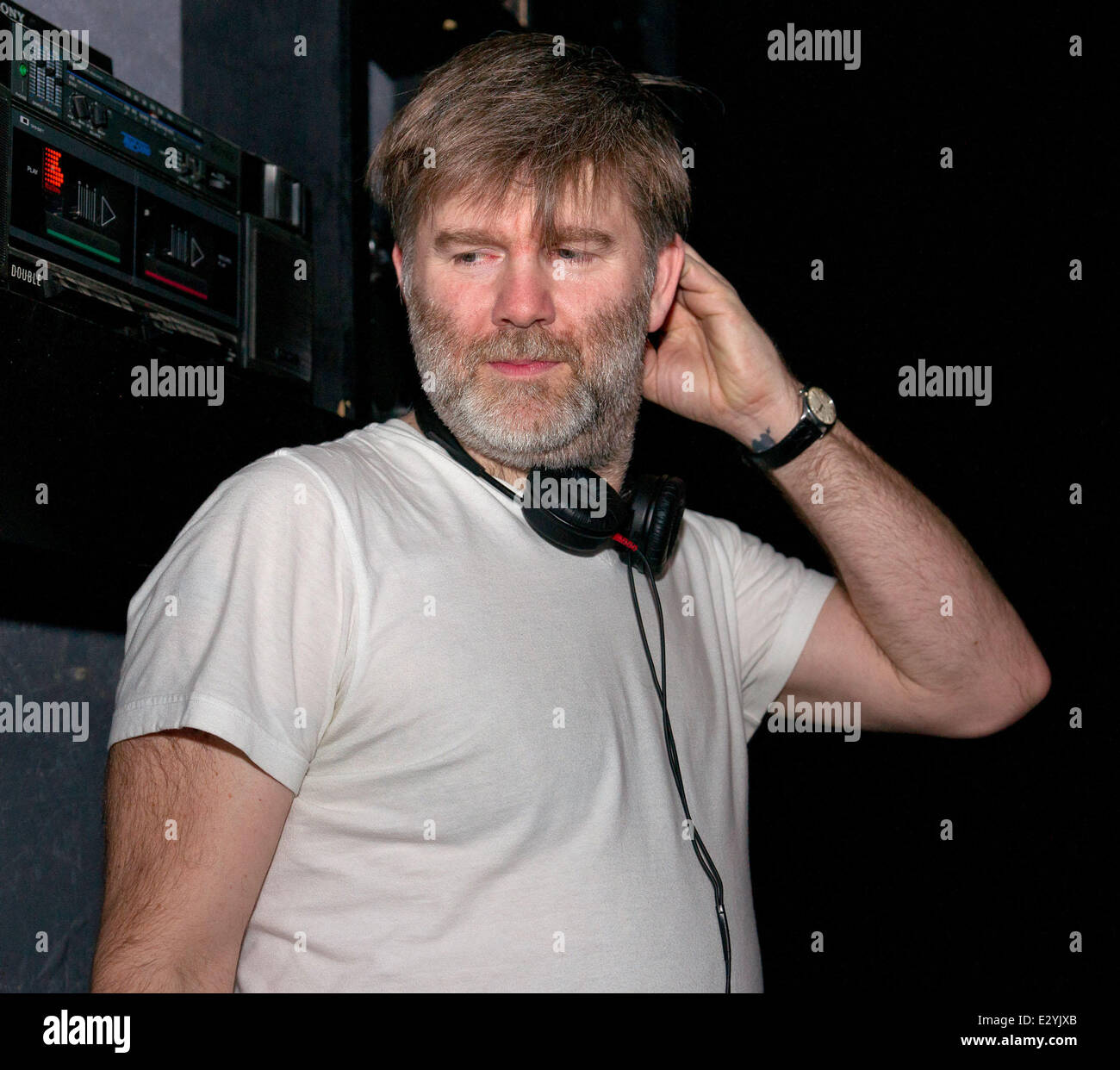 LCD Soundsystem's James Murphy performs a DJ set in an Austin nightclub ...
