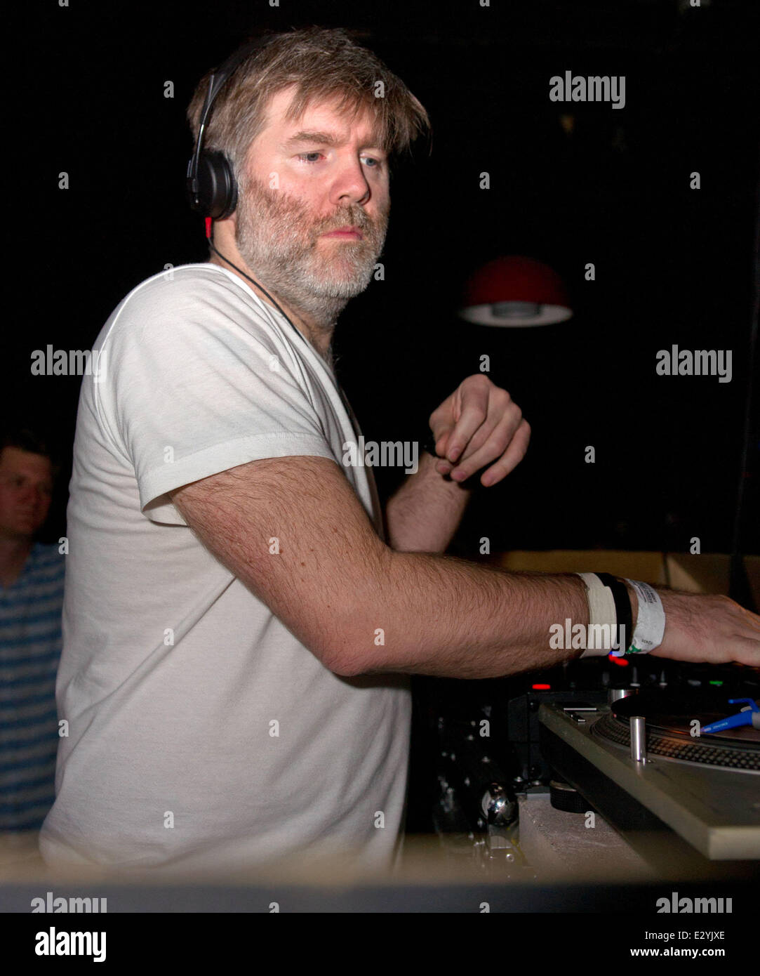 LCD Soundsystem's James Murphy performs a DJ set in an Austin nightclub ...