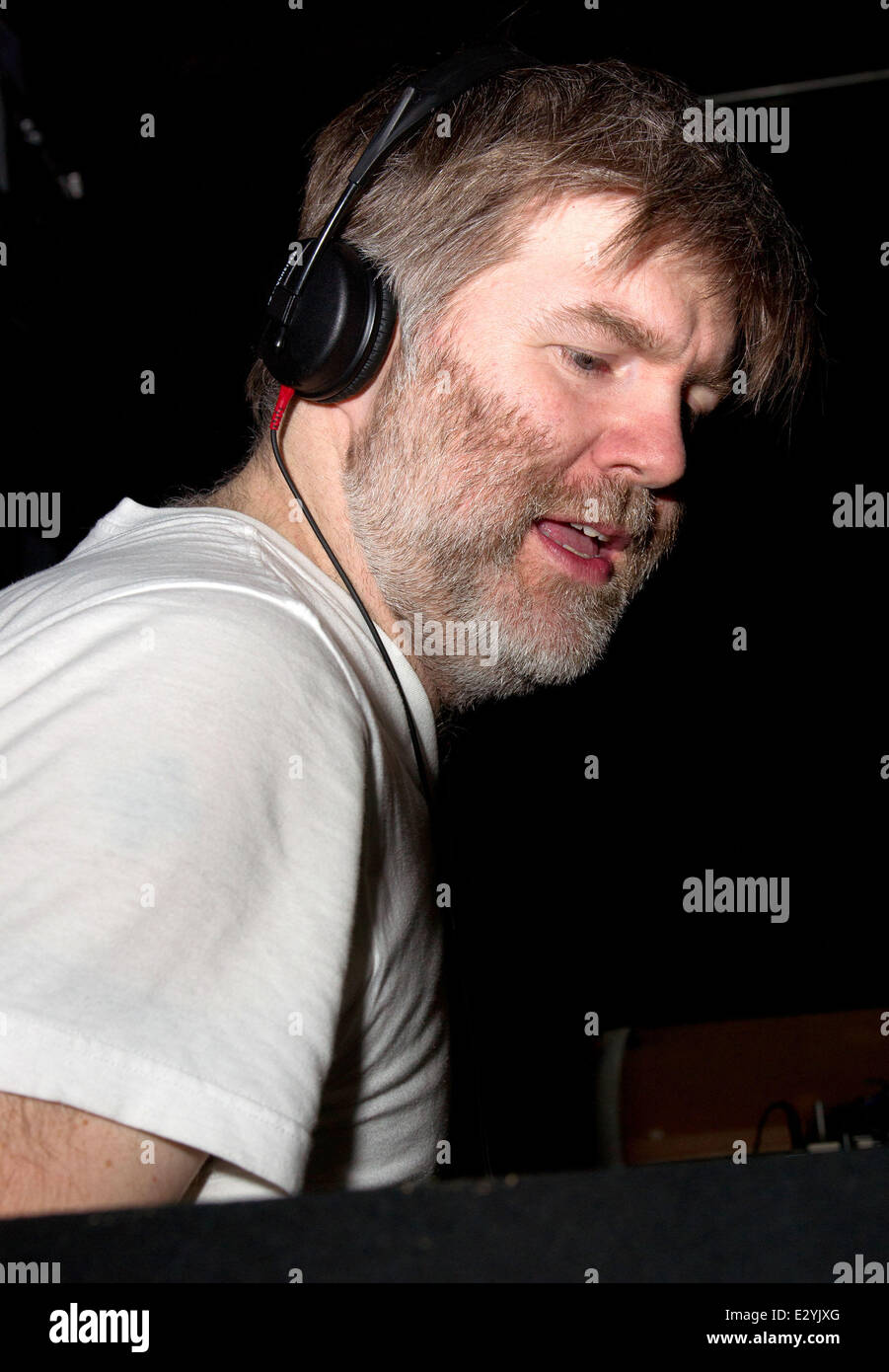 LCD Soundsystem's James Murphy performs a DJ set in an Austin nightclub ...