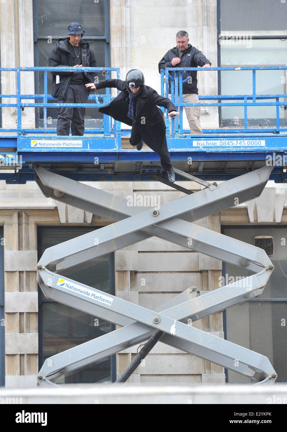 A stuntman jumps from a platform during the filming of 'Sherlock' in ...