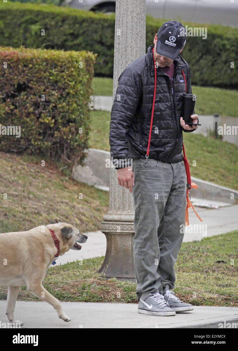 'Mad Men' star Jon Hamm walks his dog Cora, a German shepherd mix, in ...