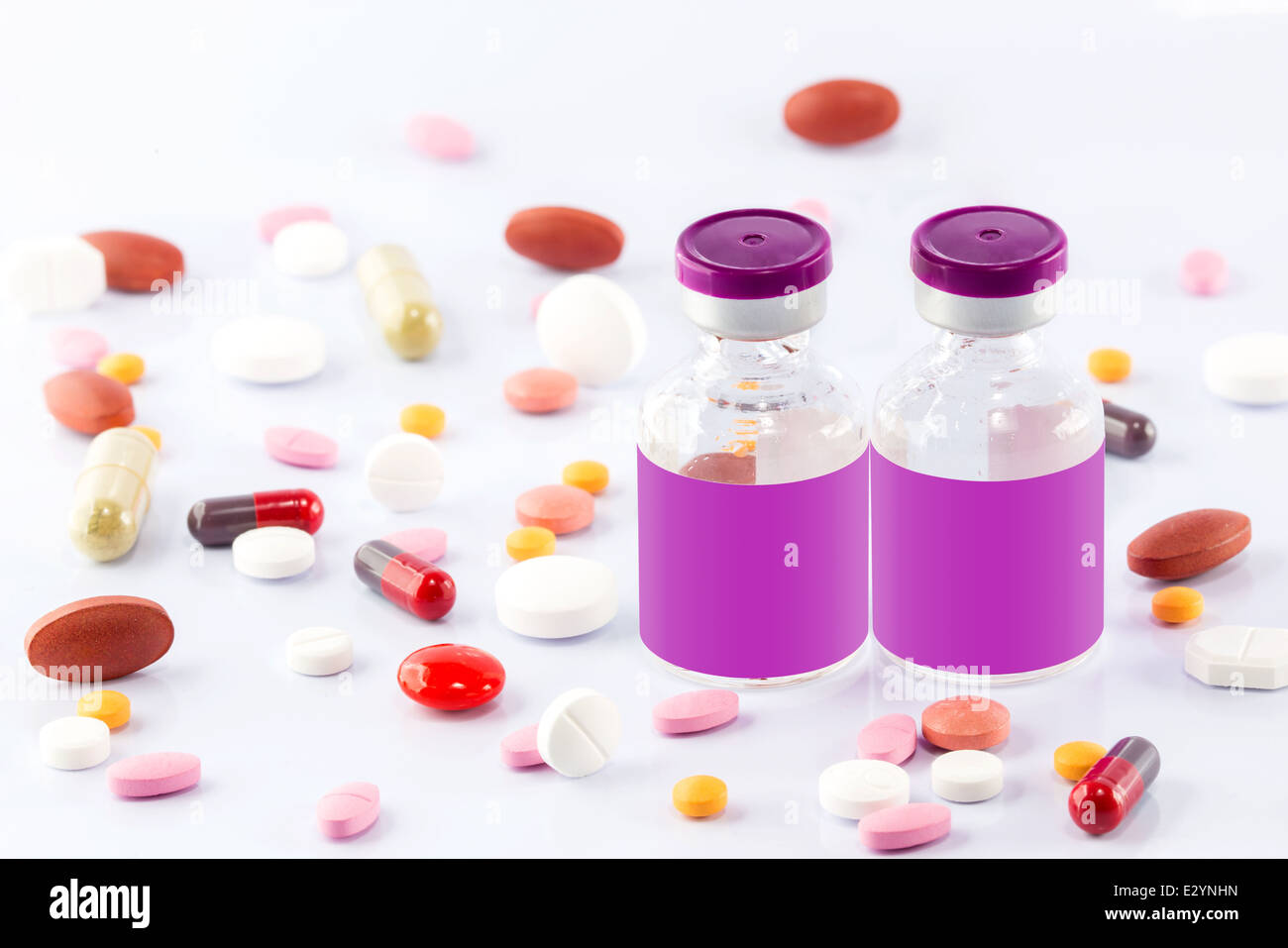 Injection vial and many kind of Medical pills isolated on white ...