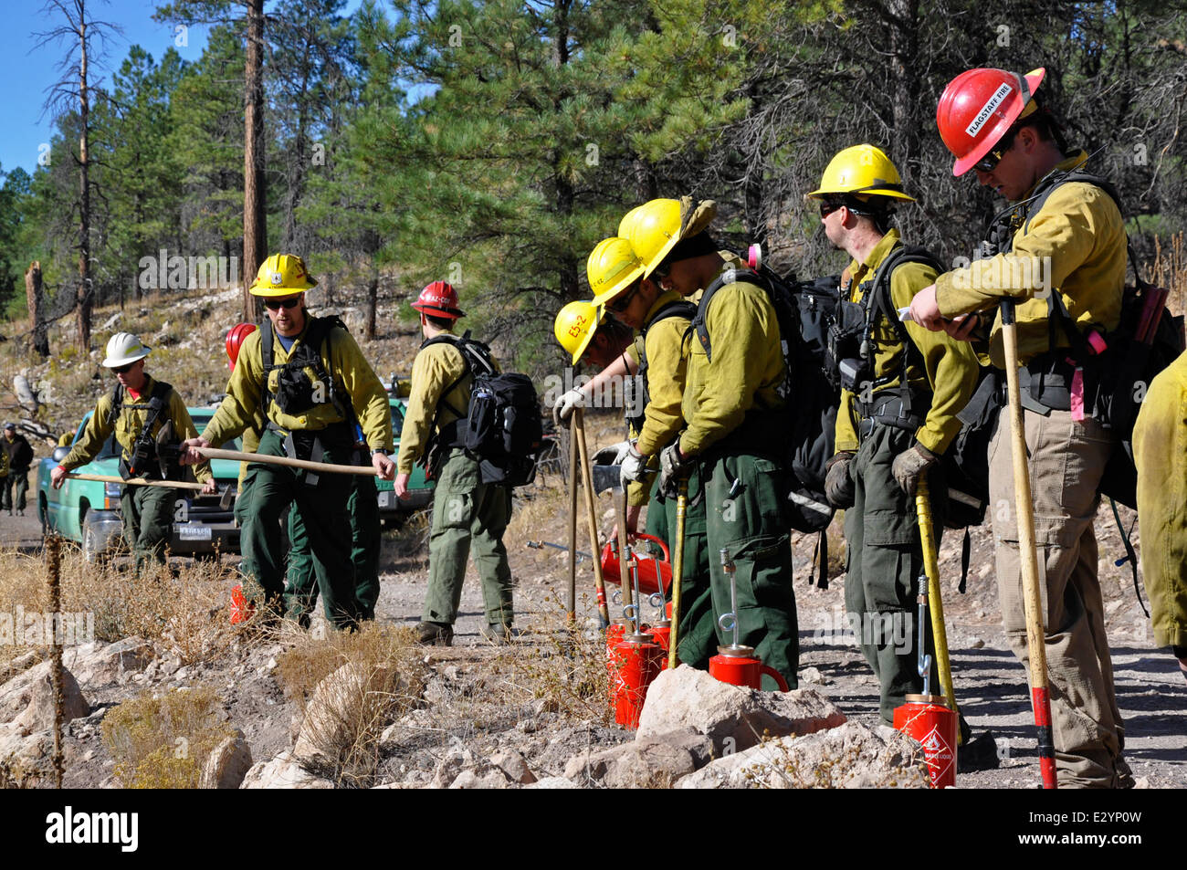 A prescribed burn is conducted by fire crews at Coconino National ...
