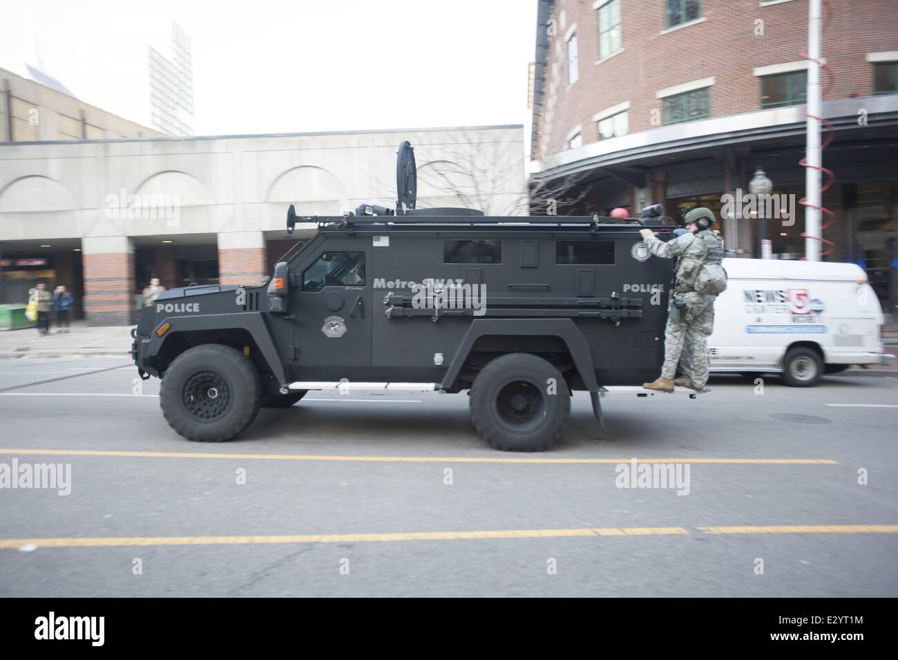 A Boston Metro SWAT vehicle patrols the area after two bomb blasts near ...