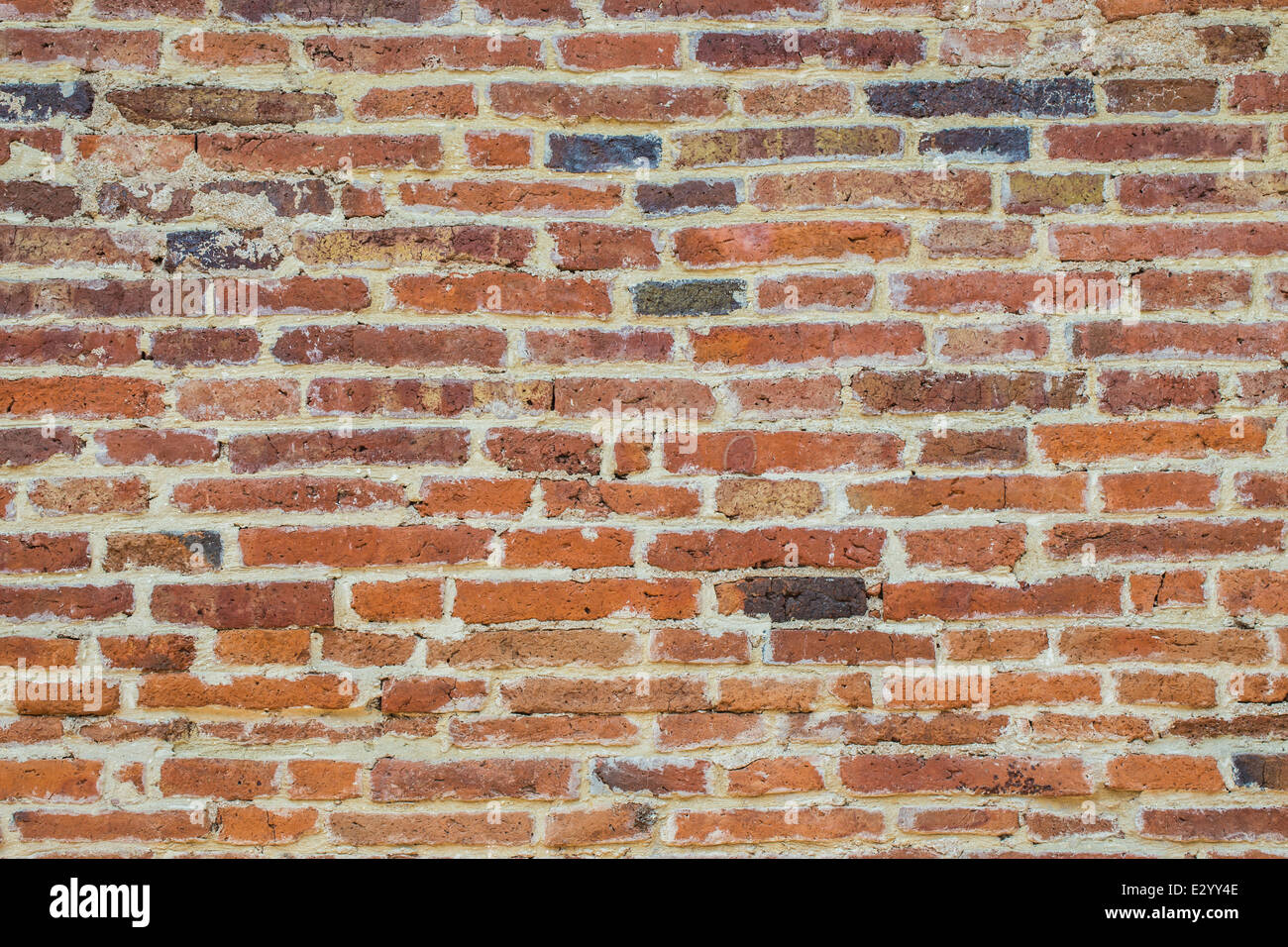 Orange old brick on wall texture background Stock Photo - Alamy