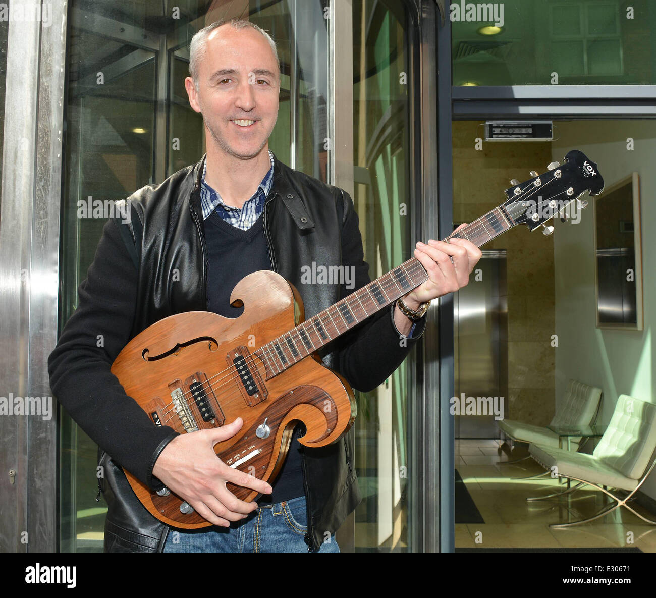Martin Nolan of Juliens Auctions at the Today FM studios with a guitar ...