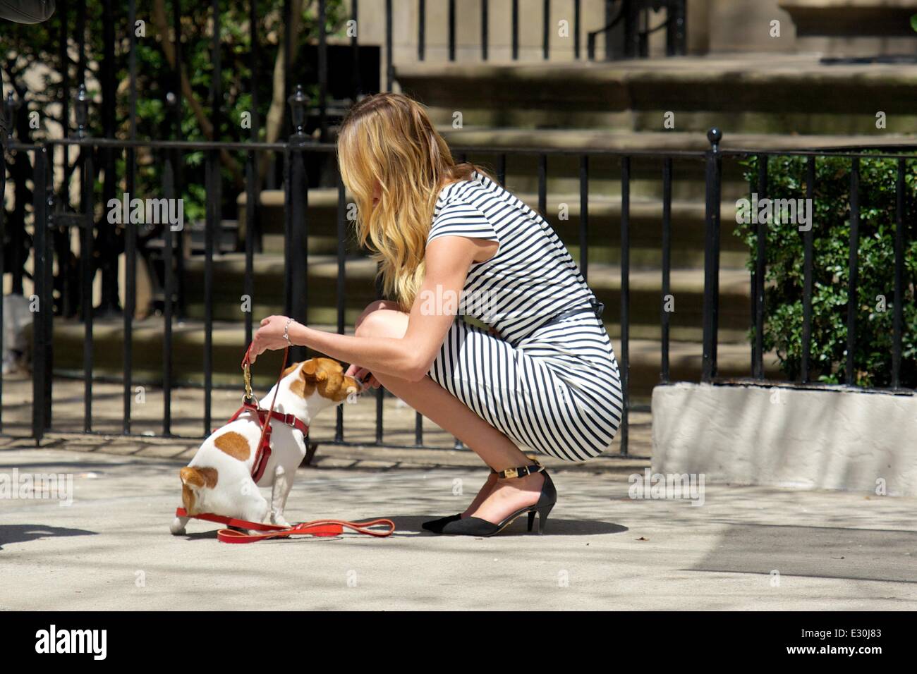 Candice Swanepoel with a little dog during a Victoria's Secret ...