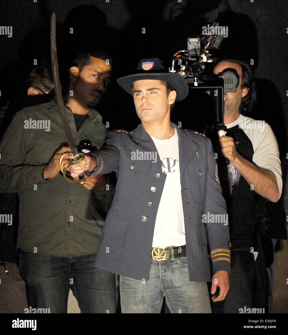 Zac Efron dressed in a confederate soldier uniform while filming a ...