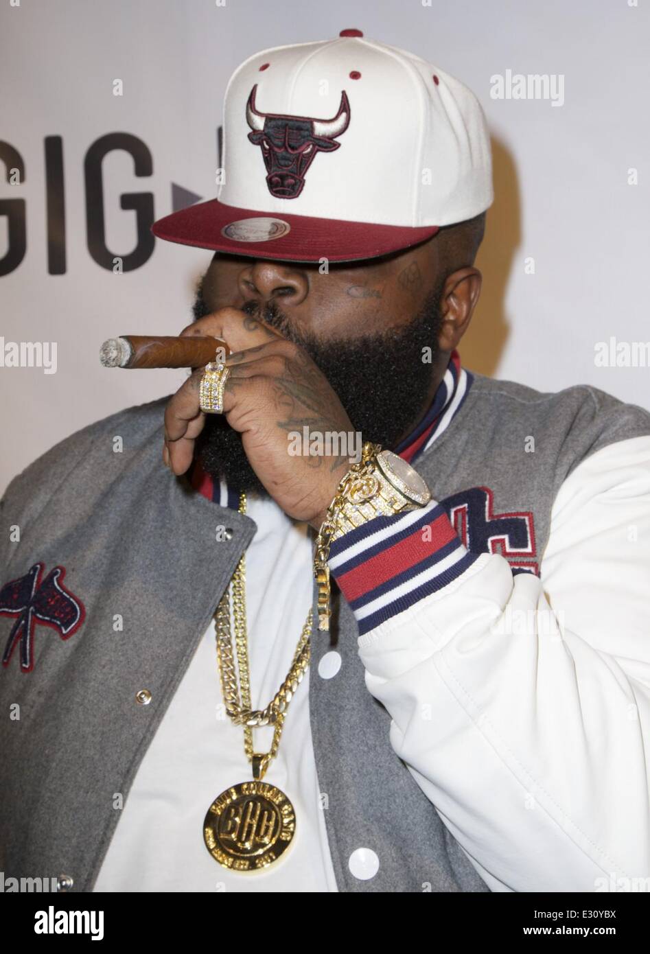 Rick Ross Smoking Cigar