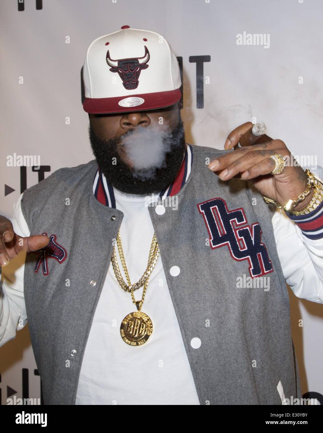 Rick Ross Smoking Cigar
