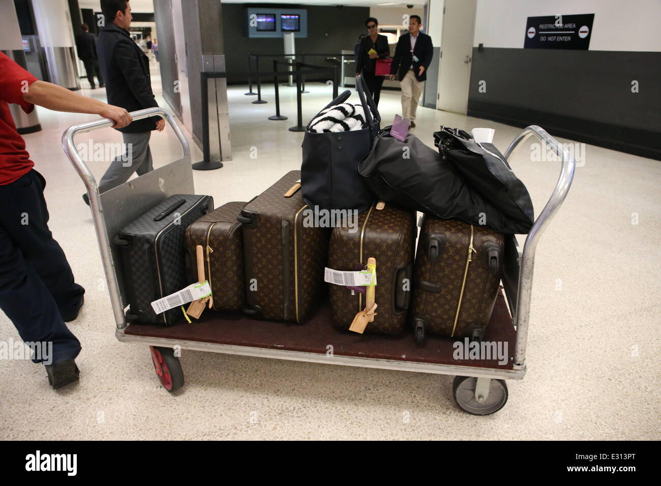 Celebrities arriving at LAX airport on an international flight ...