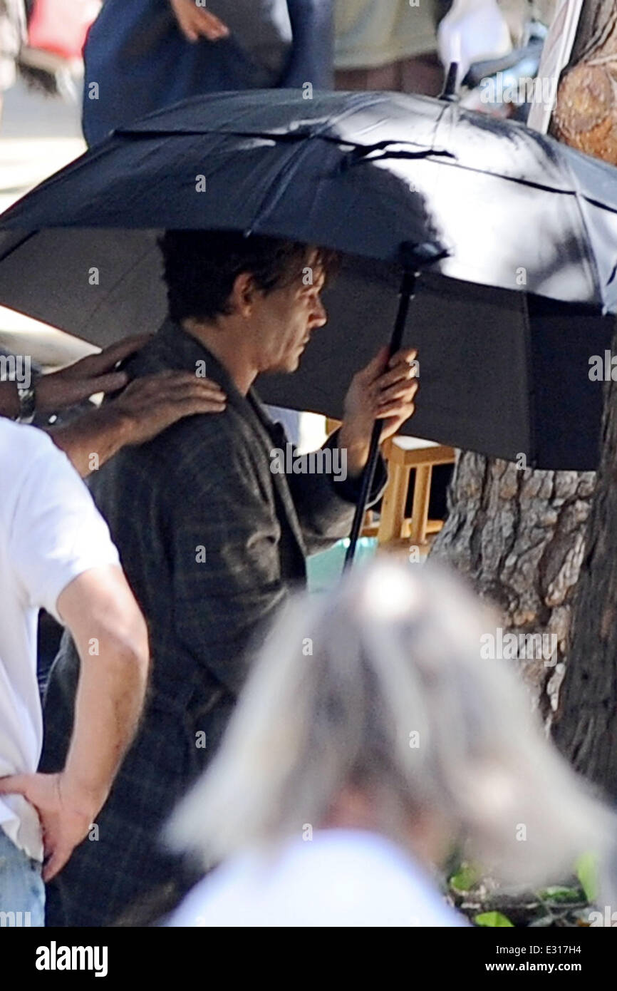 Actor Johnny Depp wearing a robe as he arrives on the set of ...