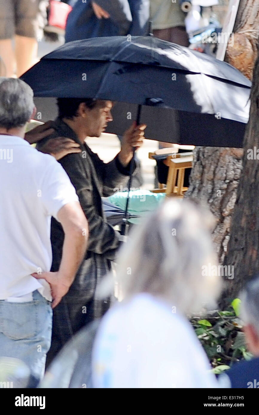 Actor Johnny Depp wearing a robe as he arrives on the set of ...