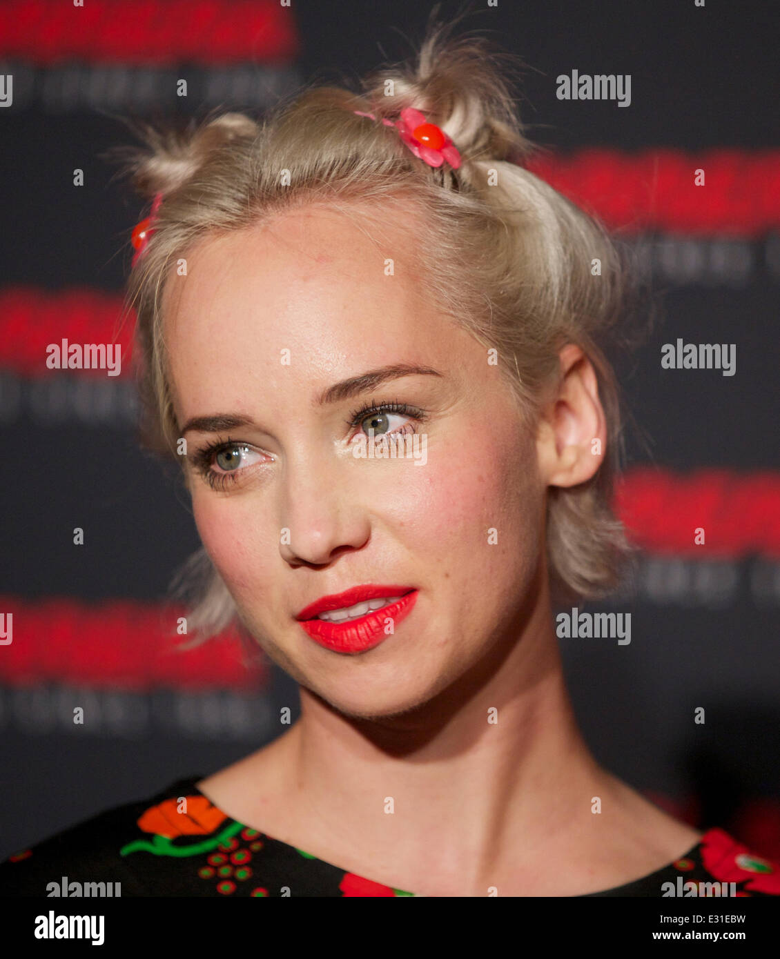 Carrera Retrospective Exhibition - Arrivals Featuring: Caitlin Moe ...