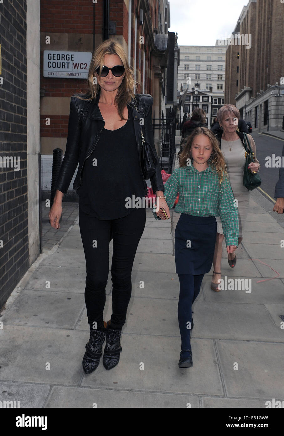 Kate Moss and her daughter Lila Grace Moss attend an exhibition of ...