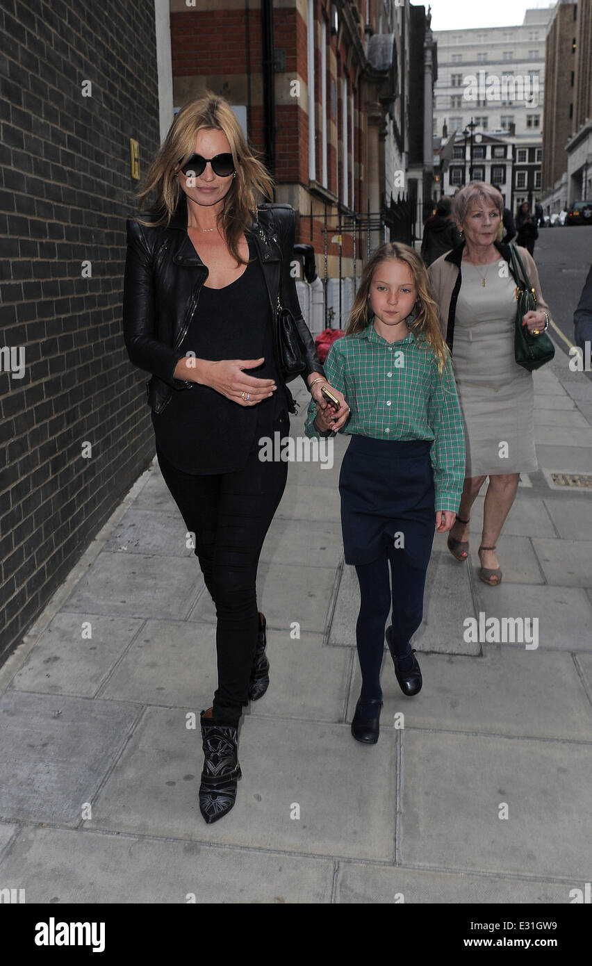 Kate Moss and her daughter Lila Grace Moss attend an exhibition of ...