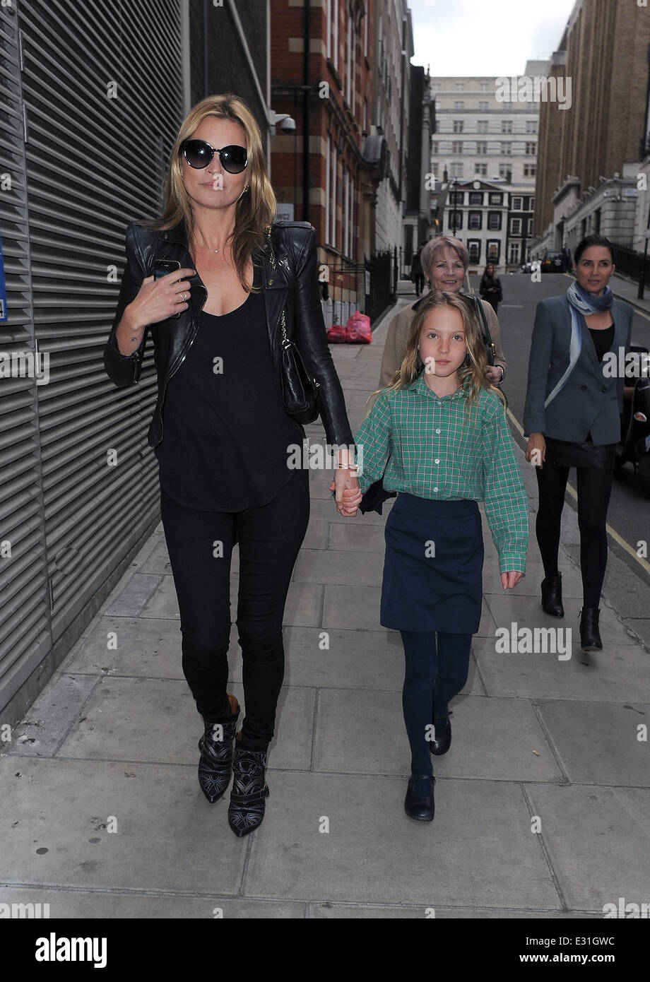 Kate Moss and her daughter Lila Grace Moss attend an exhibition of ...