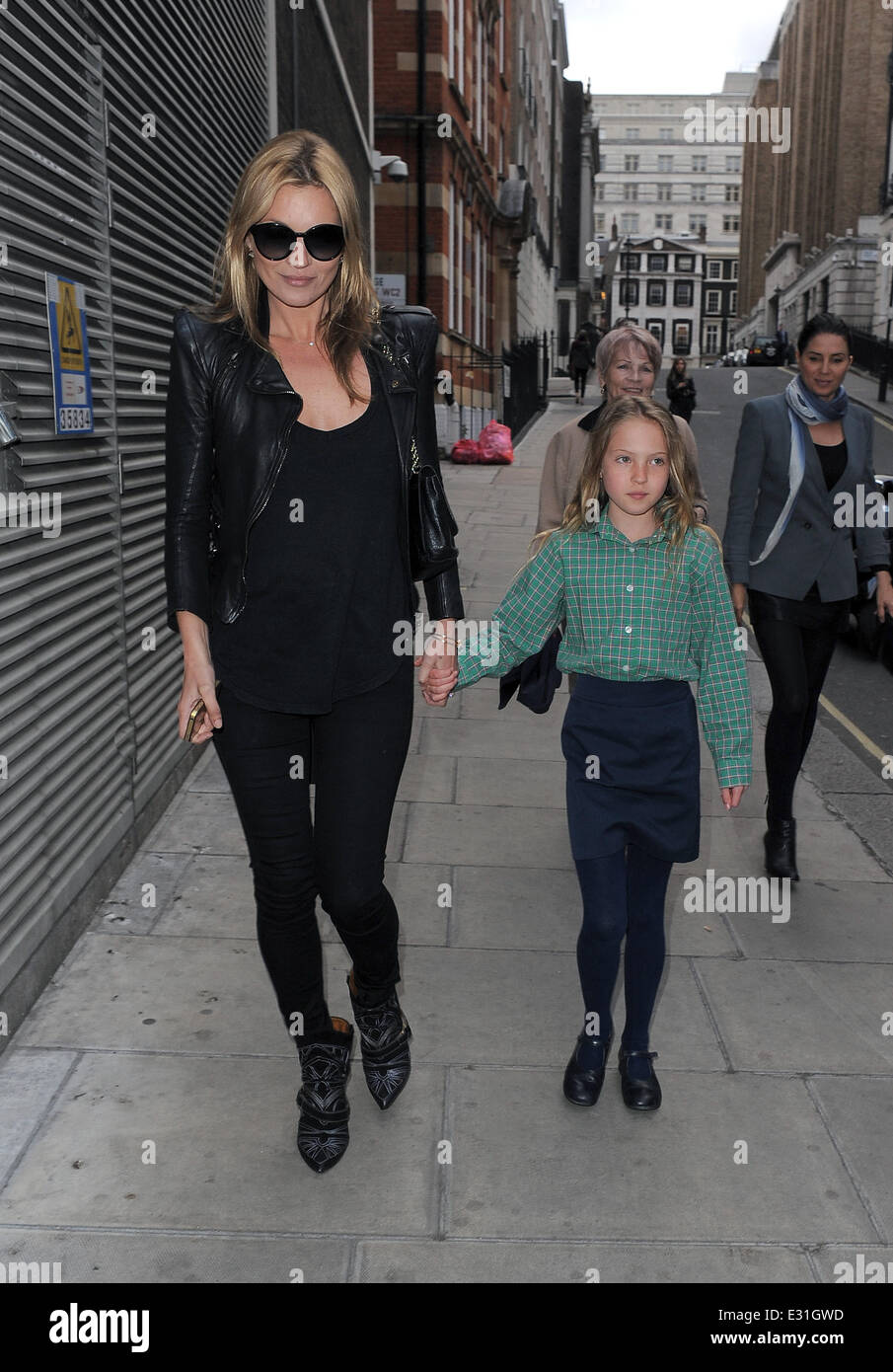 Kate Moss and her daughter Lila Grace Moss attend an exhibition of ...