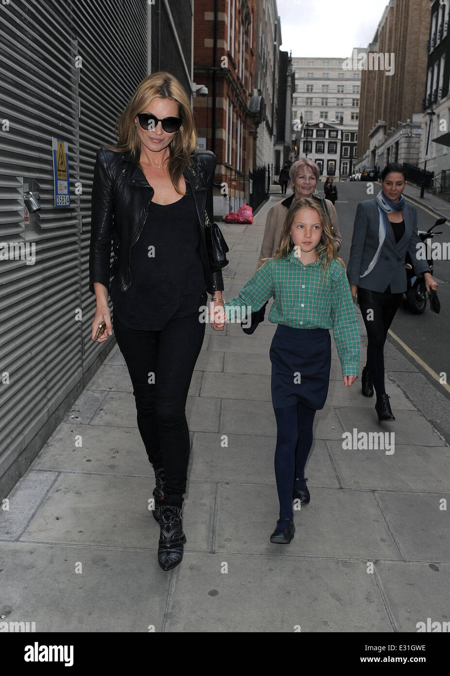 Kate Moss and her daughter Lila Grace Moss attend an exhibition of ...