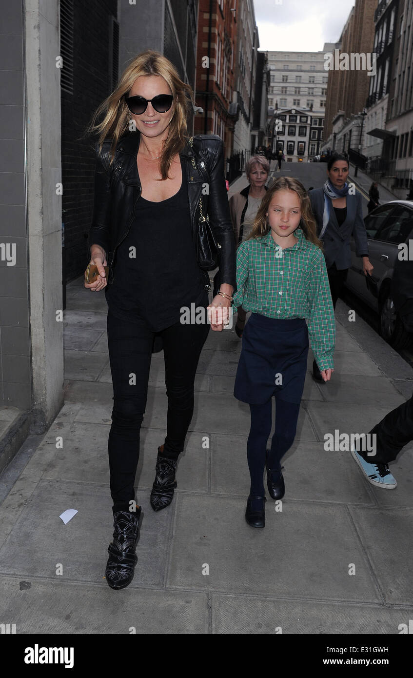 Kate Moss and her daughter Lila Grace Moss attend an exhibition of ...