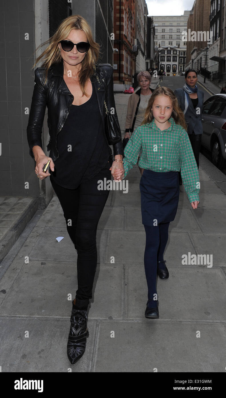 Kate Moss and her daughter Lila Grace Moss attend an exhibition of ...