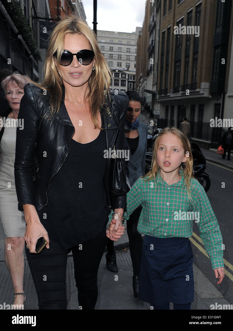 Kate Moss and her daughter Lila Grace Moss attend an exhibition of ...
