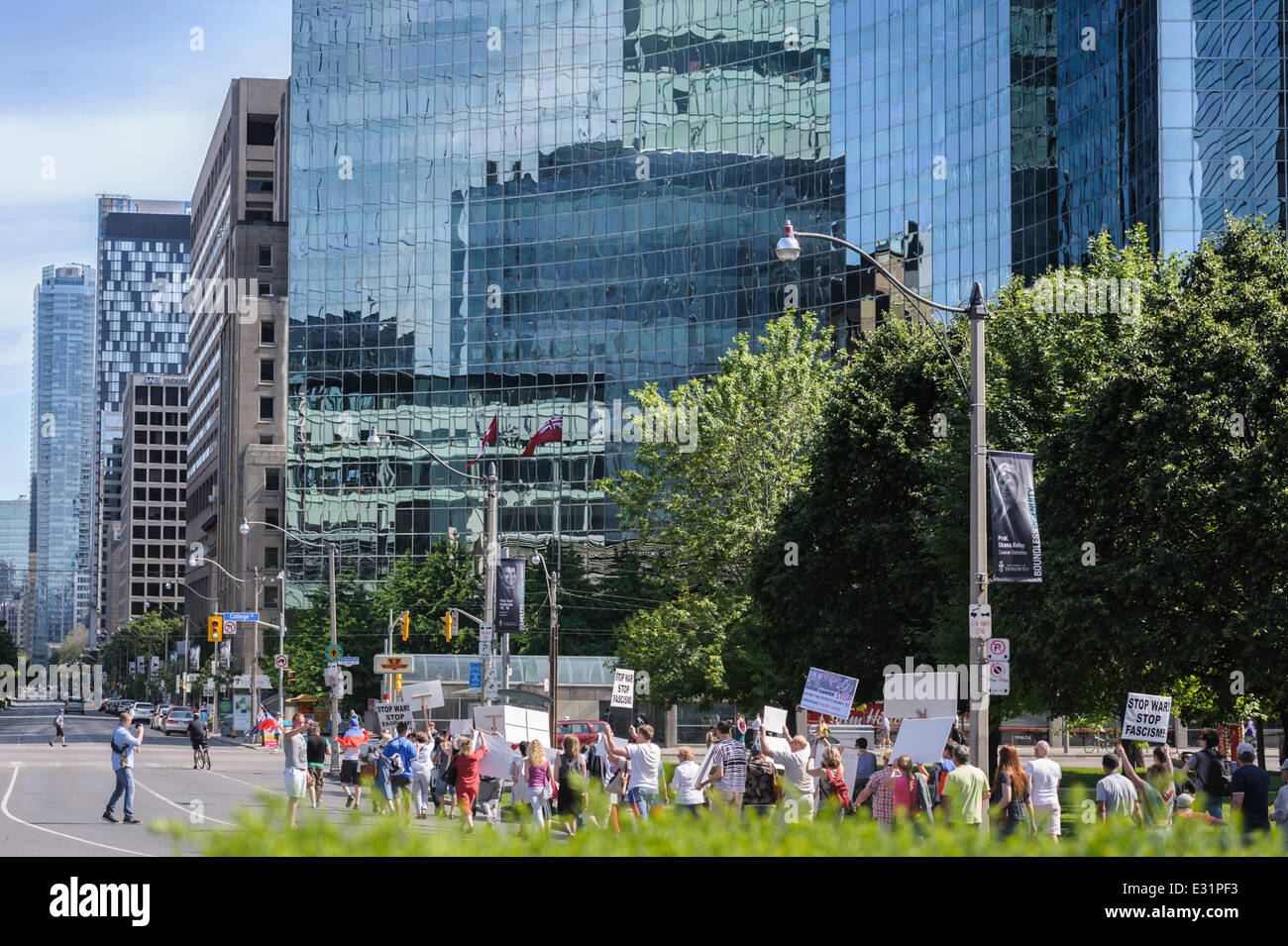 Toronto, Canada. 21st June 2014. Group of protesters marches from ...