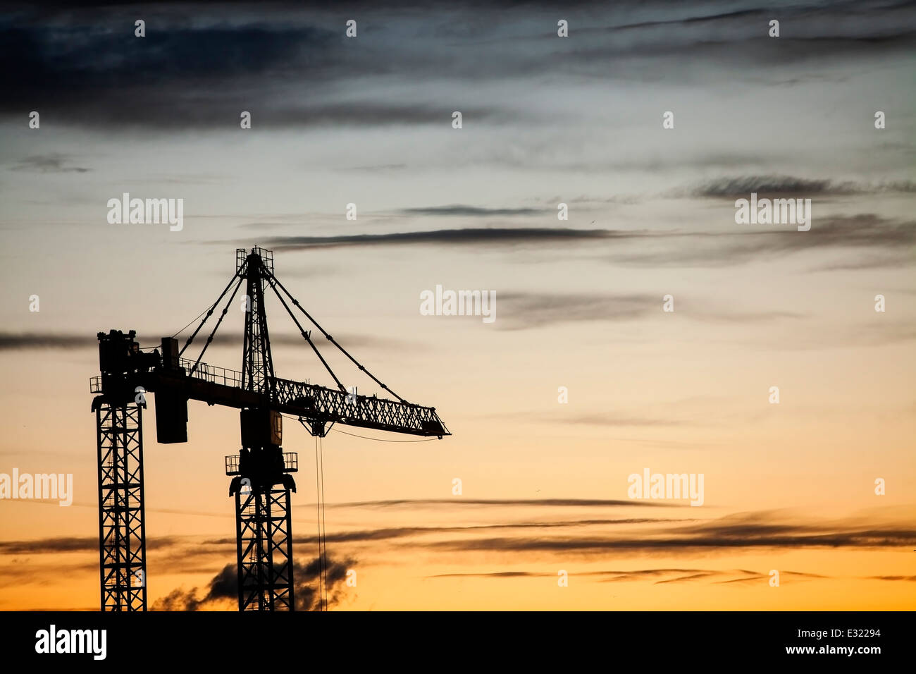 Color picture of some cranes on a construction site, as dusk Stock ...