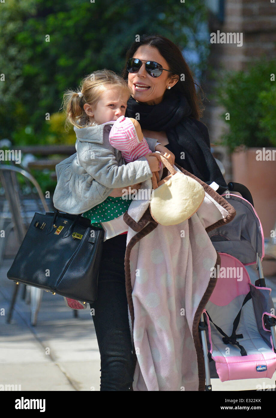 Bethenny Frankel seen carrying her daughter Bryn Hoppy while out and ...