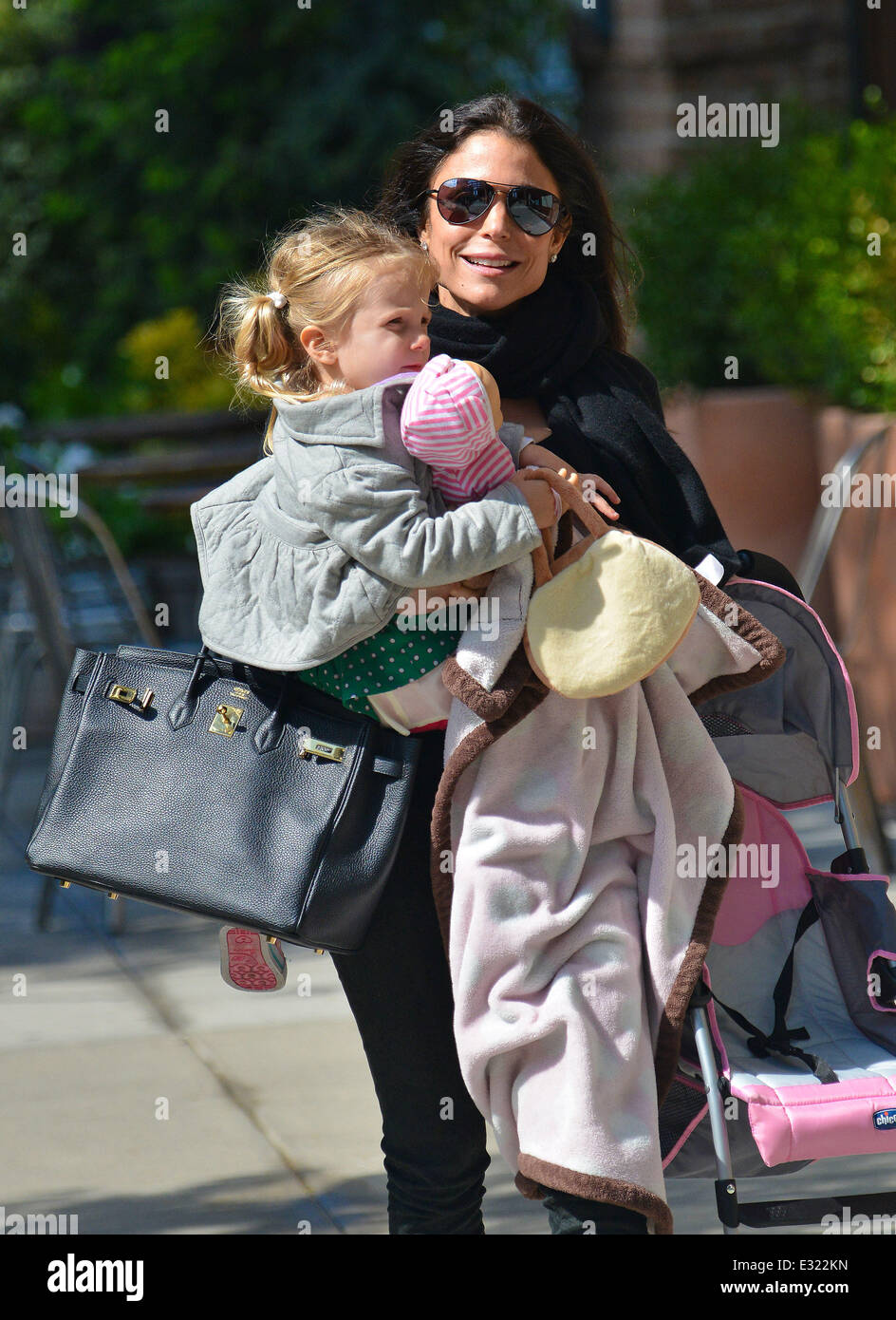 Bethenny Frankel seen carrying her daughter Bryn Hoppy while out and ...
