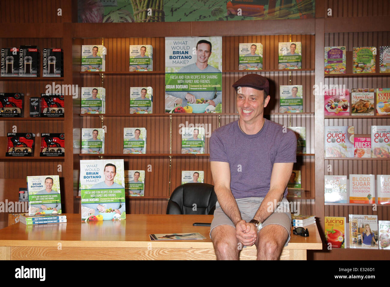 Olympic Gold Medalist BRIAN BOITANO signing copies of Olympic Gold Medalist BRIAN BOITANO signing copies of
