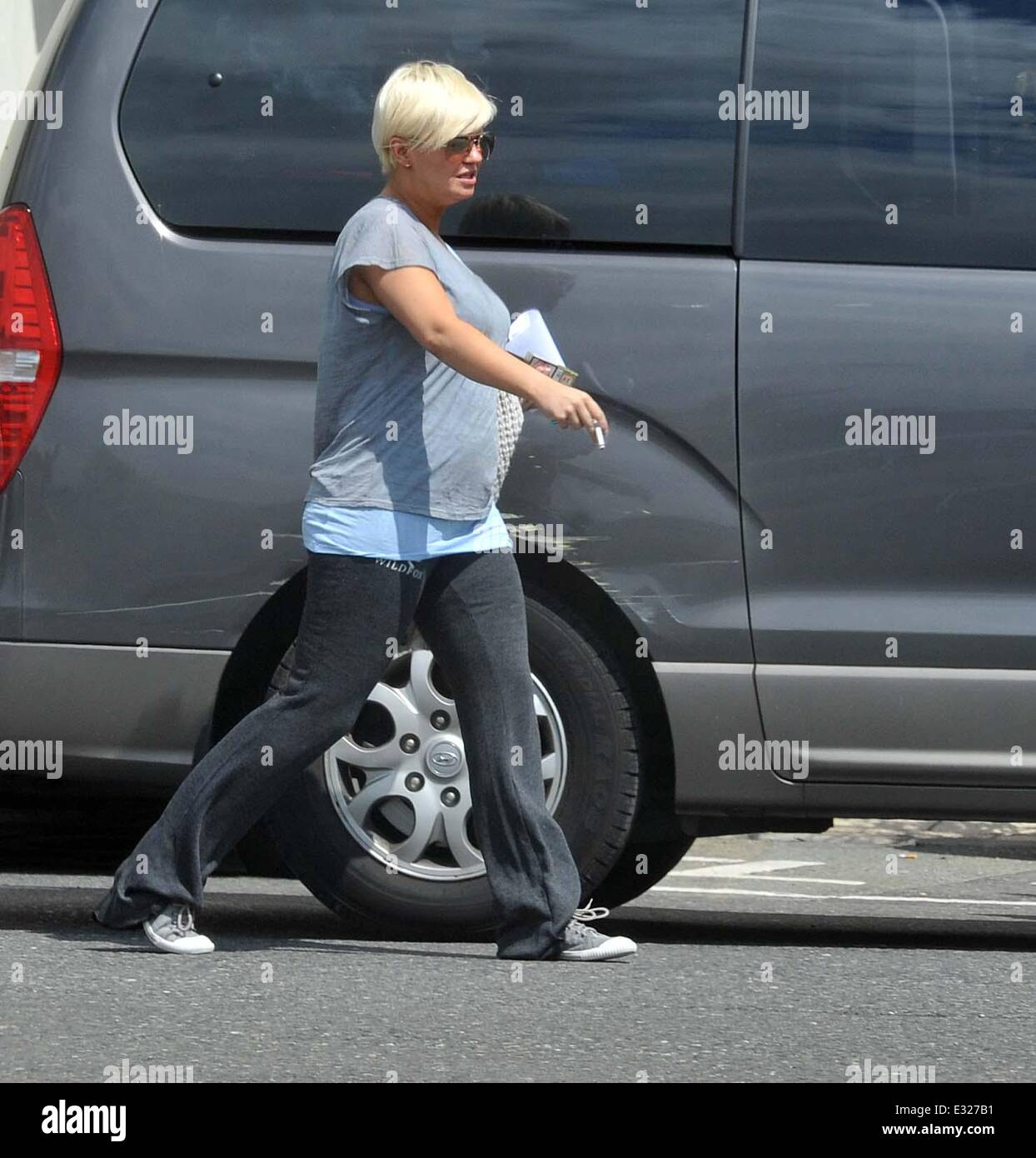 Kerry Katona seen smoking as she left her hotel today to board the Big ...
