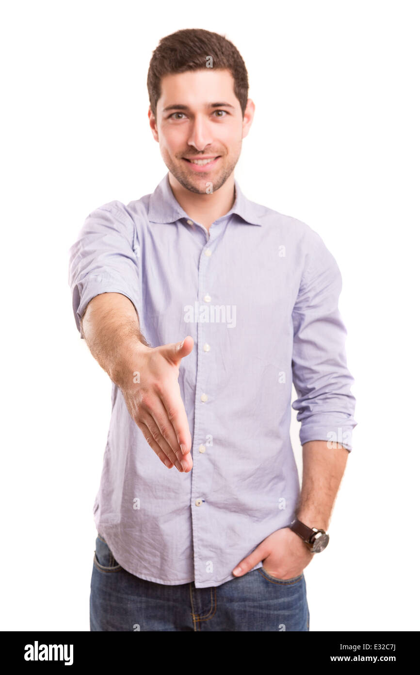 Young business man offering handshake Stock Photo - Alamy