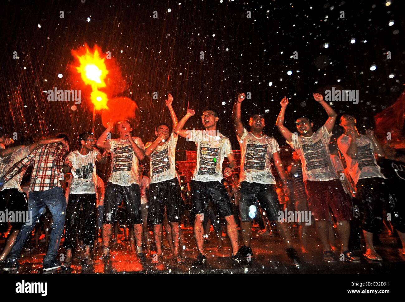 Wuhan. 22nd June, 2014. Graduates celebrate their graduation with a ...