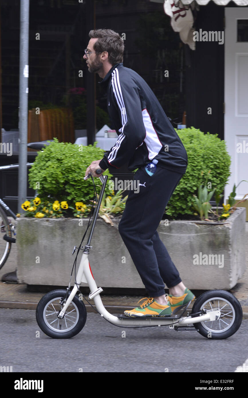 Actor Hugh Jackman seen riding a scooter around the West Village ...