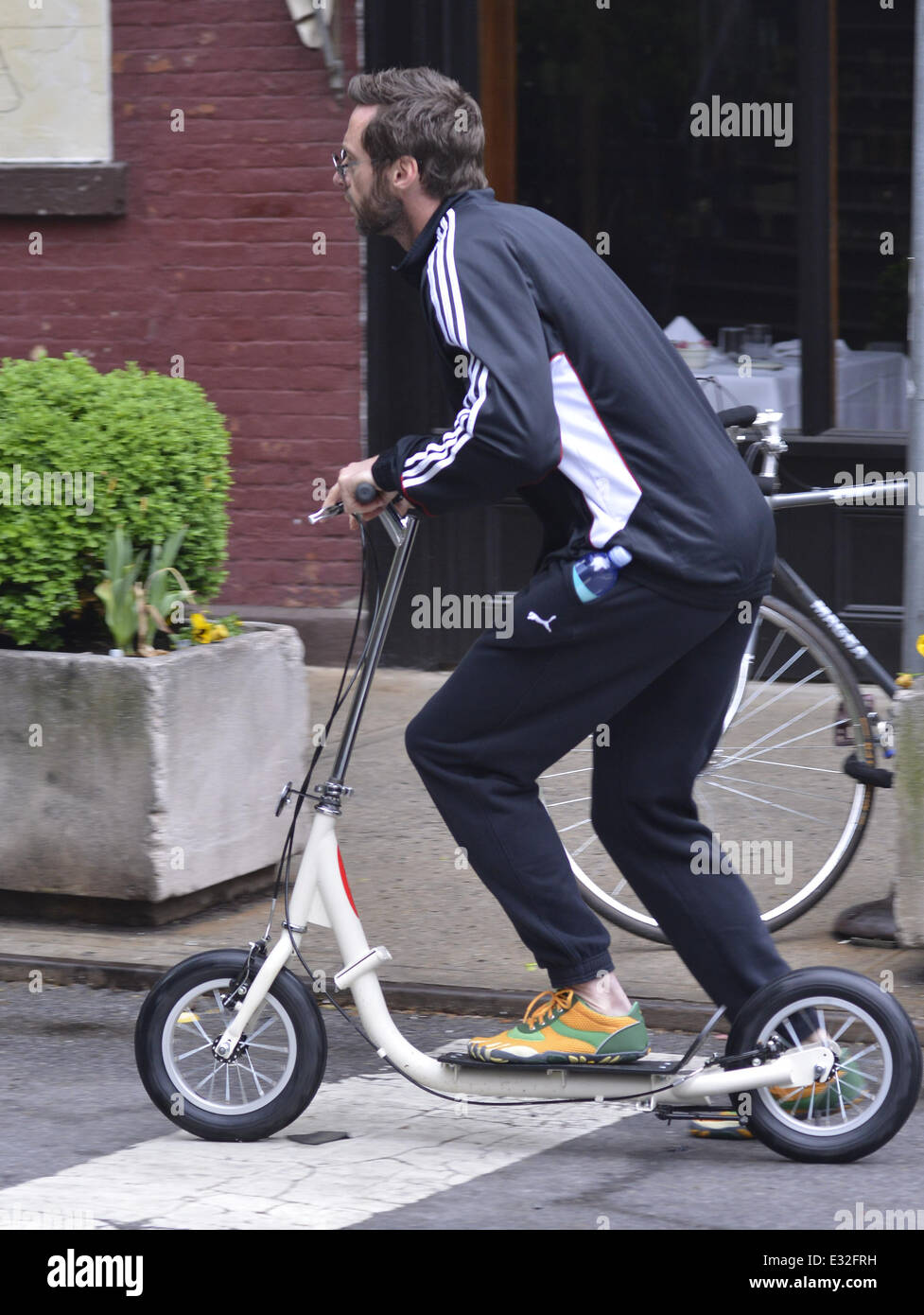 Actor Hugh Jackman seen riding a scooter around the West Village ...
