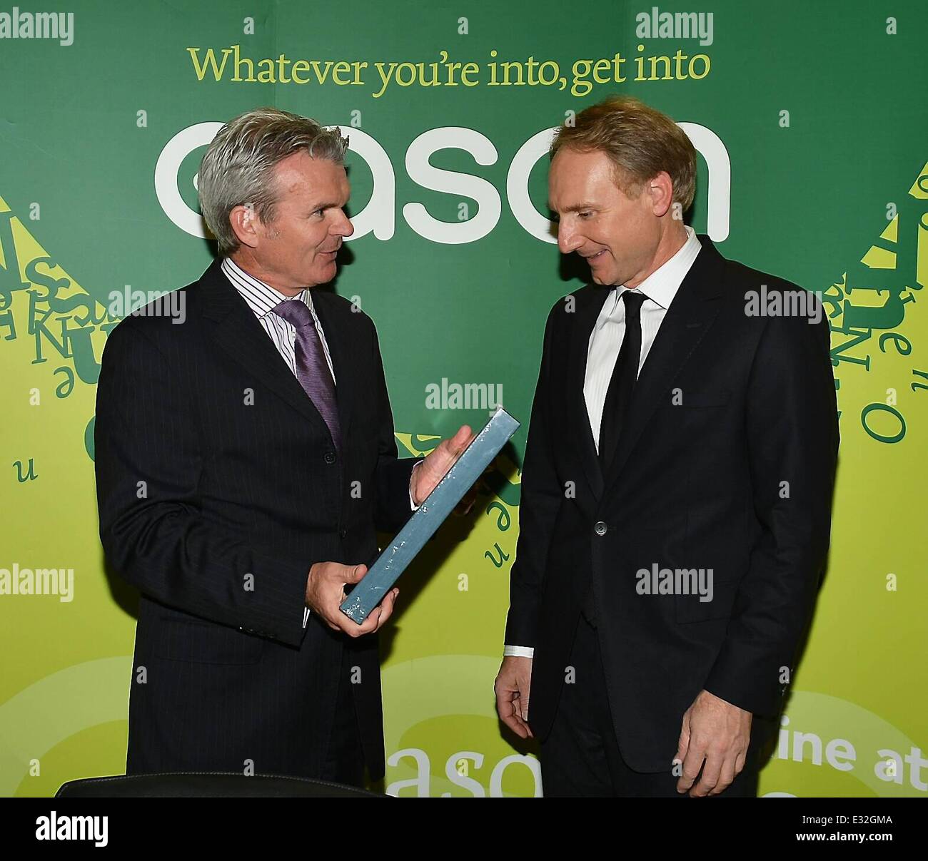 Author of the Da Vinci Code, Dan Brown is presented with a copy of the ...