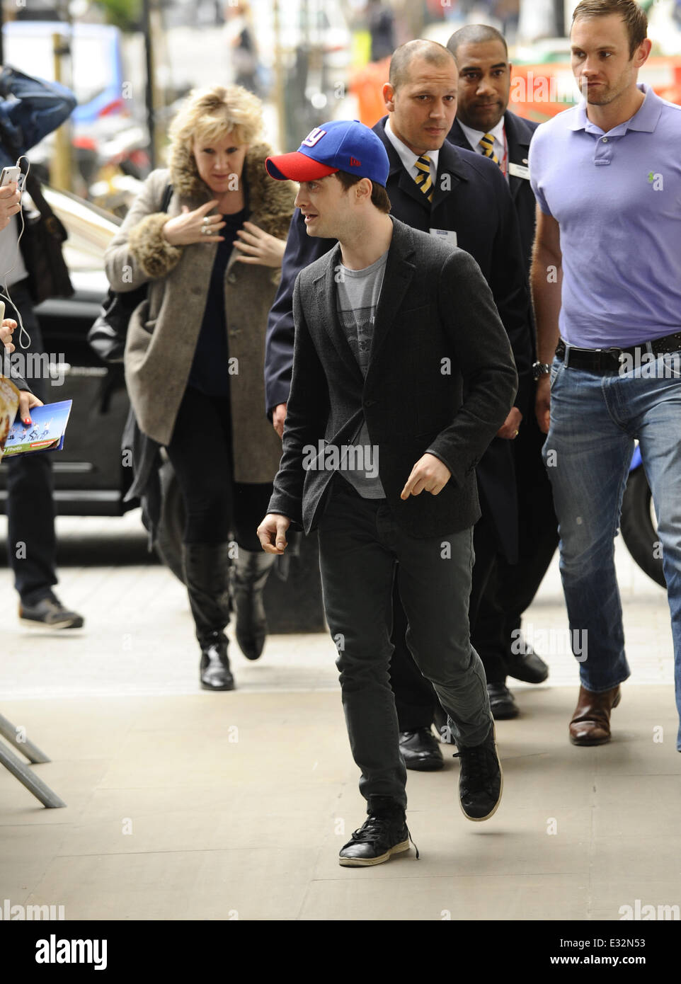 Daniel Radcliffe seen arriving and signing autographs at BBC studios ...