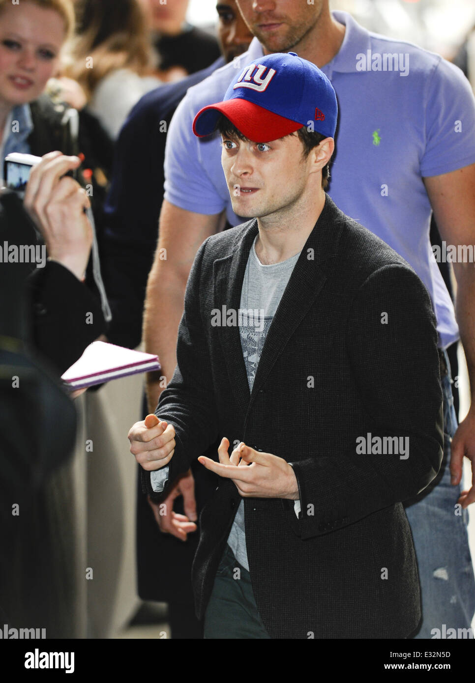 Daniel Radcliffe seen arriving and signing autographs at BBC studios ...