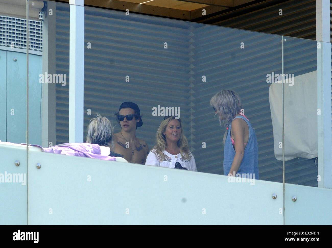 Harry Styles of One Direction seen by the swimming pool of his hotel in ...