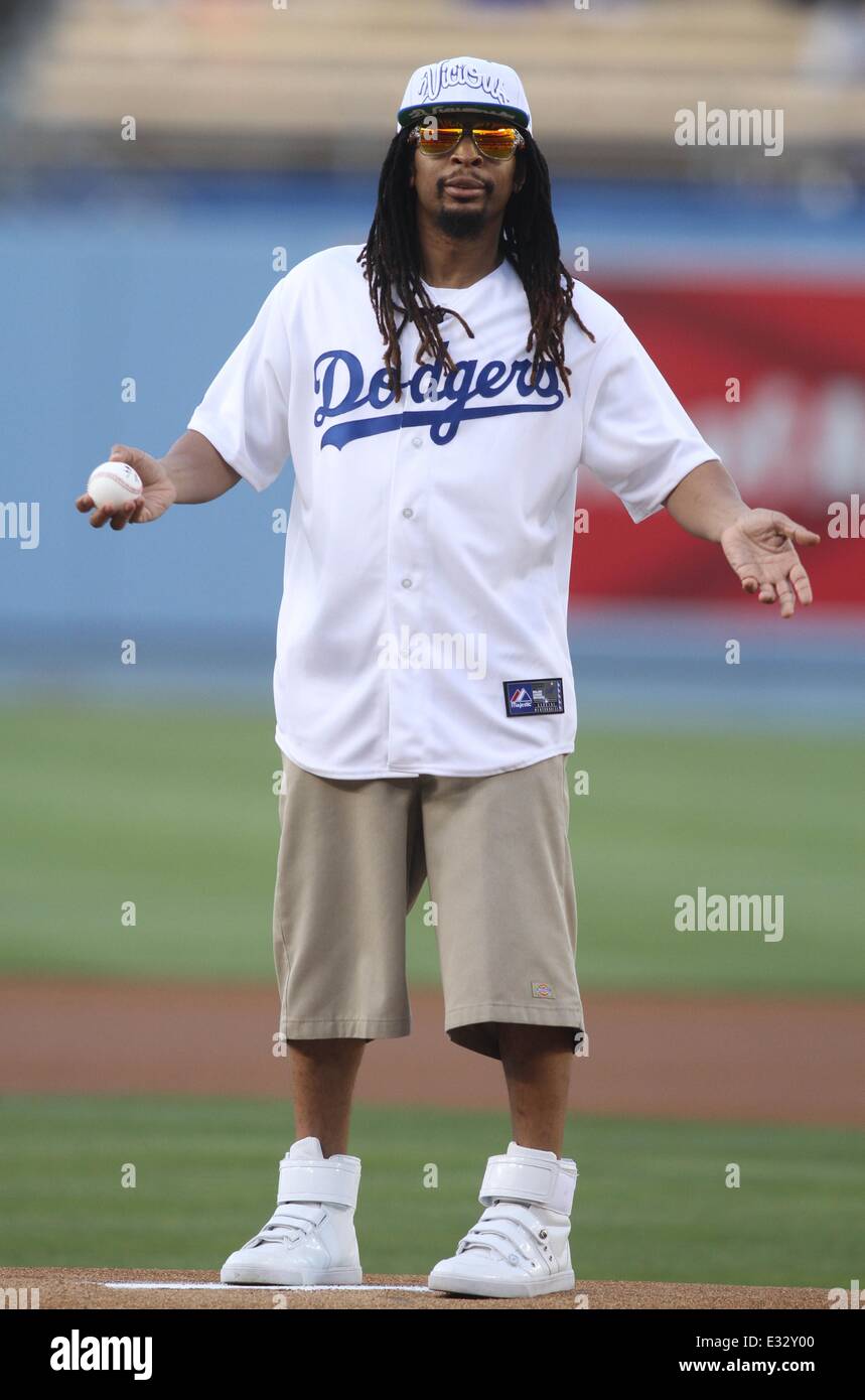 Rapper Lil Jon throws a ceremonial first pitch before the game between ...