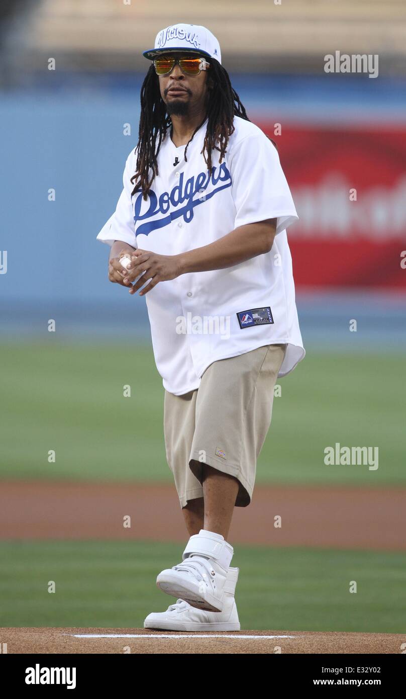 Rapper Lil Jon throws a ceremonial first pitch before the game between ...