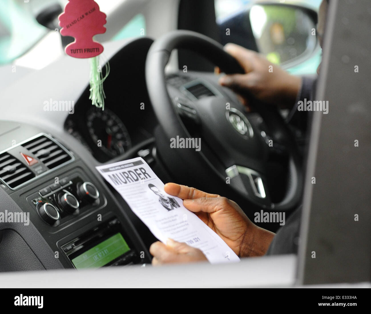 Police hand out flyers that appeal for information about the Woolwich ...