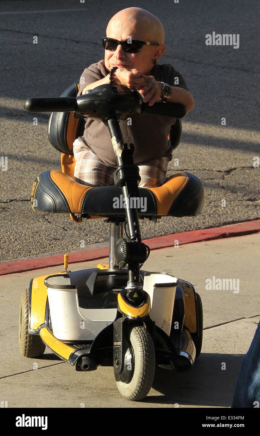 Verne Troyer riding on his scooter on Little Santa Monica Boulevard in ...