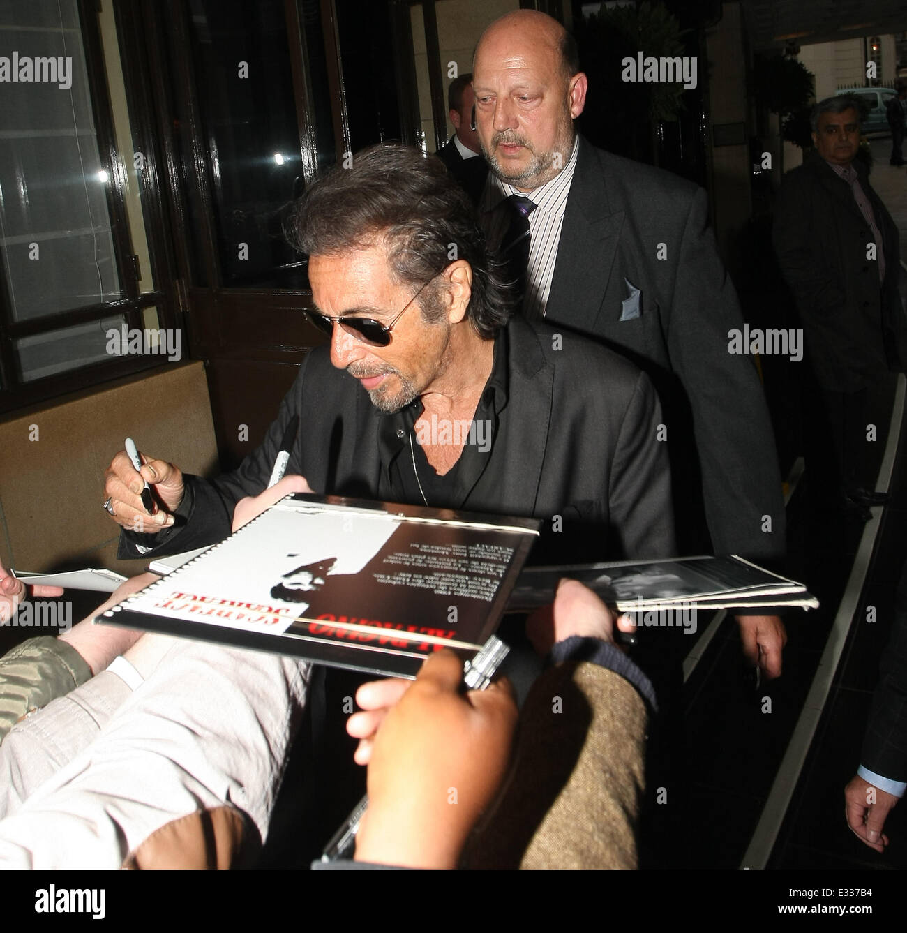 Al Pacino is swamped by fans wanting an autograph as he leaves his ...
