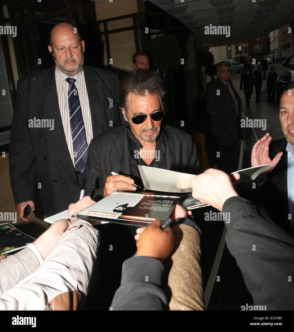 Al Pacino is swamped by fans wanting an autograph as he leaves his ...