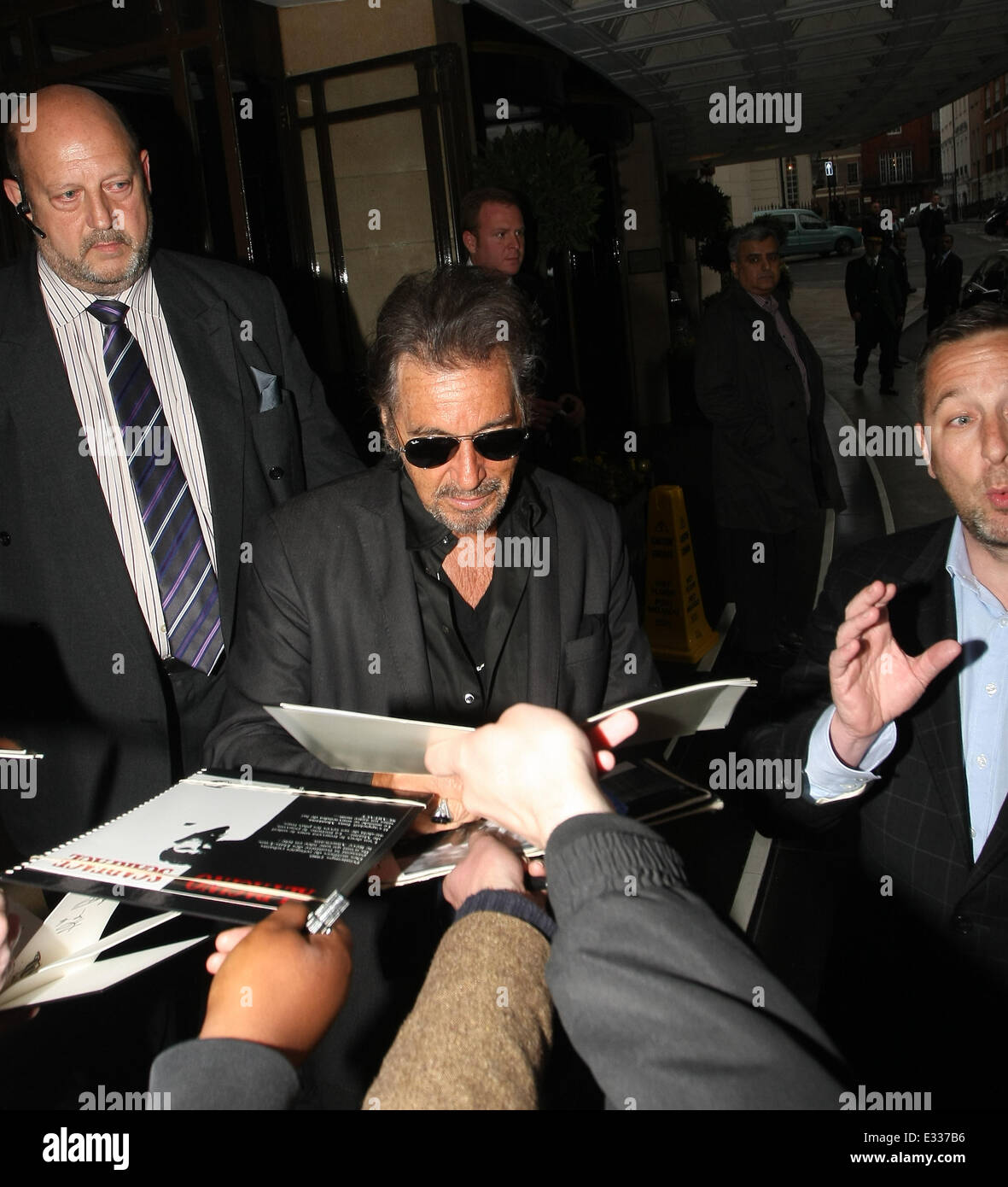 Al Pacino is swamped by fans wanting an autograph as he leaves his ...