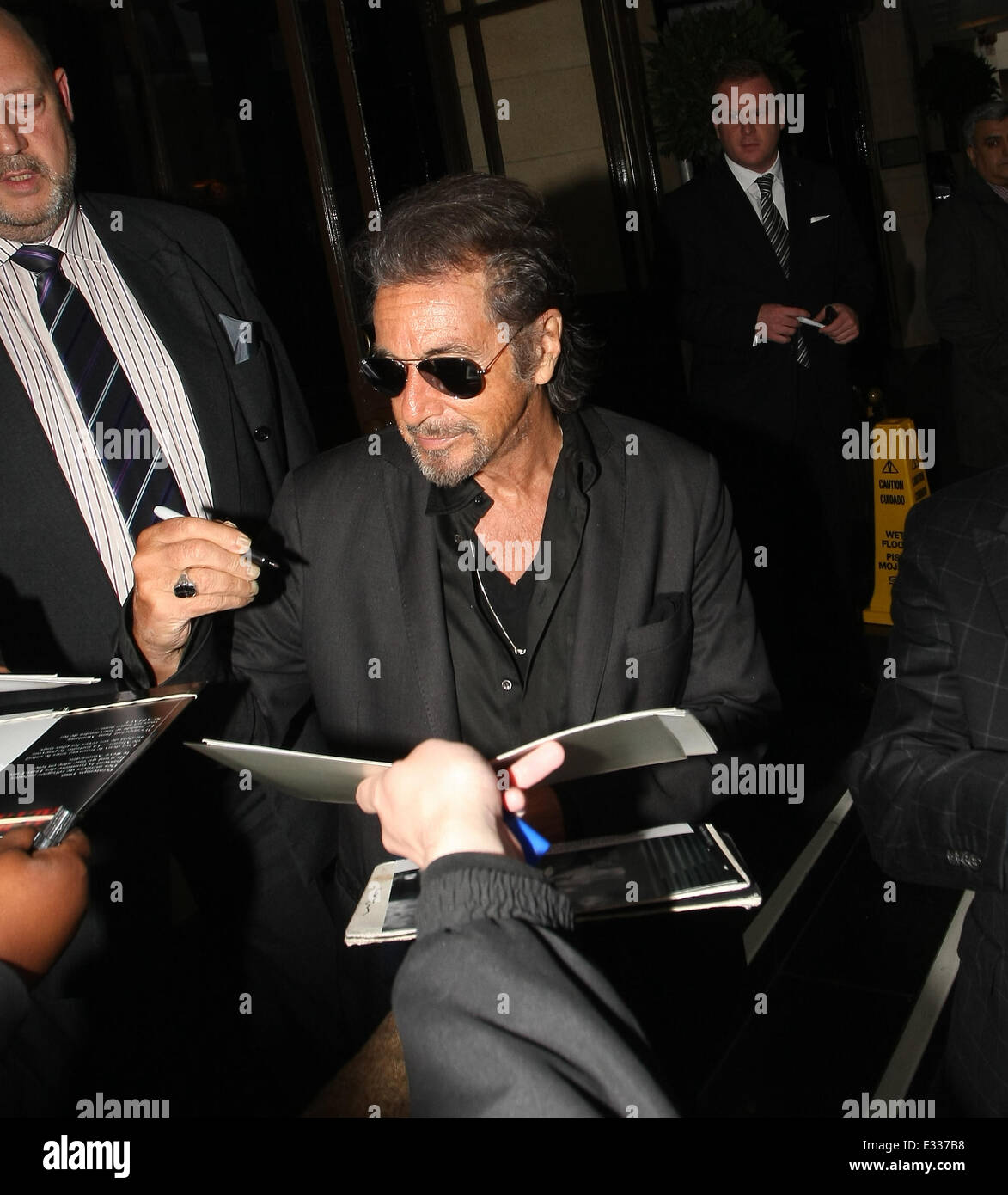 Al Pacino is swamped by fans wanting an autograph as he leaves his ...