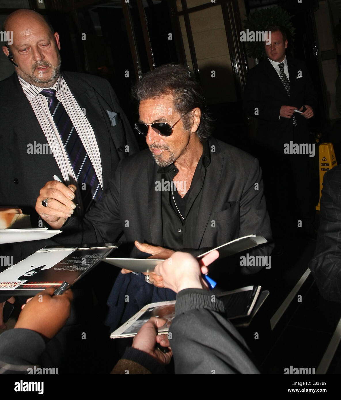 Al Pacino is swamped by fans wanting an autograph as he leaves his ...