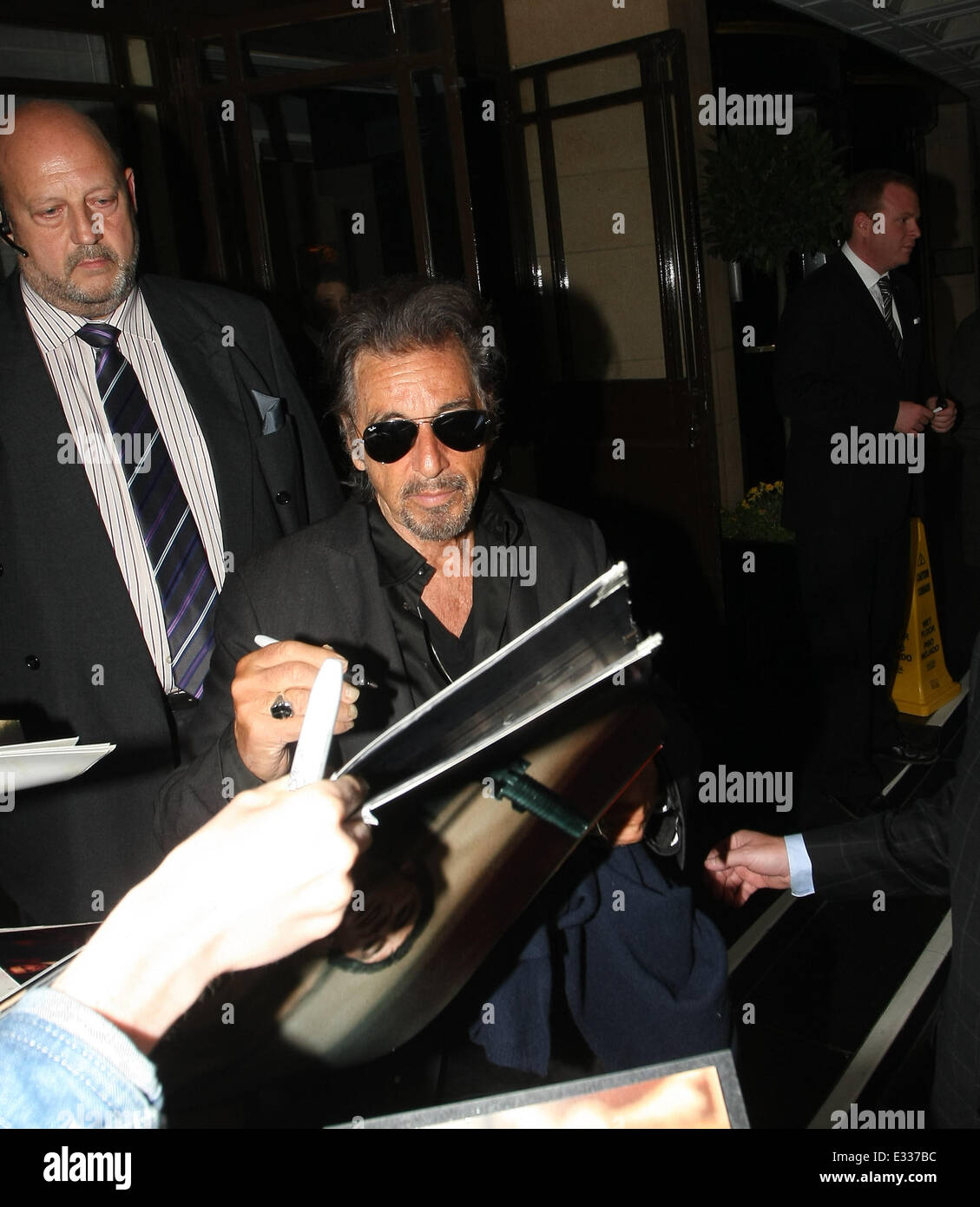 Al Pacino is swamped by fans wanting an autograph as he leaves his ...